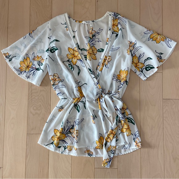 Sienna Sky | Tops | Sienna Sky White Floral Wrap Top | Poshmark